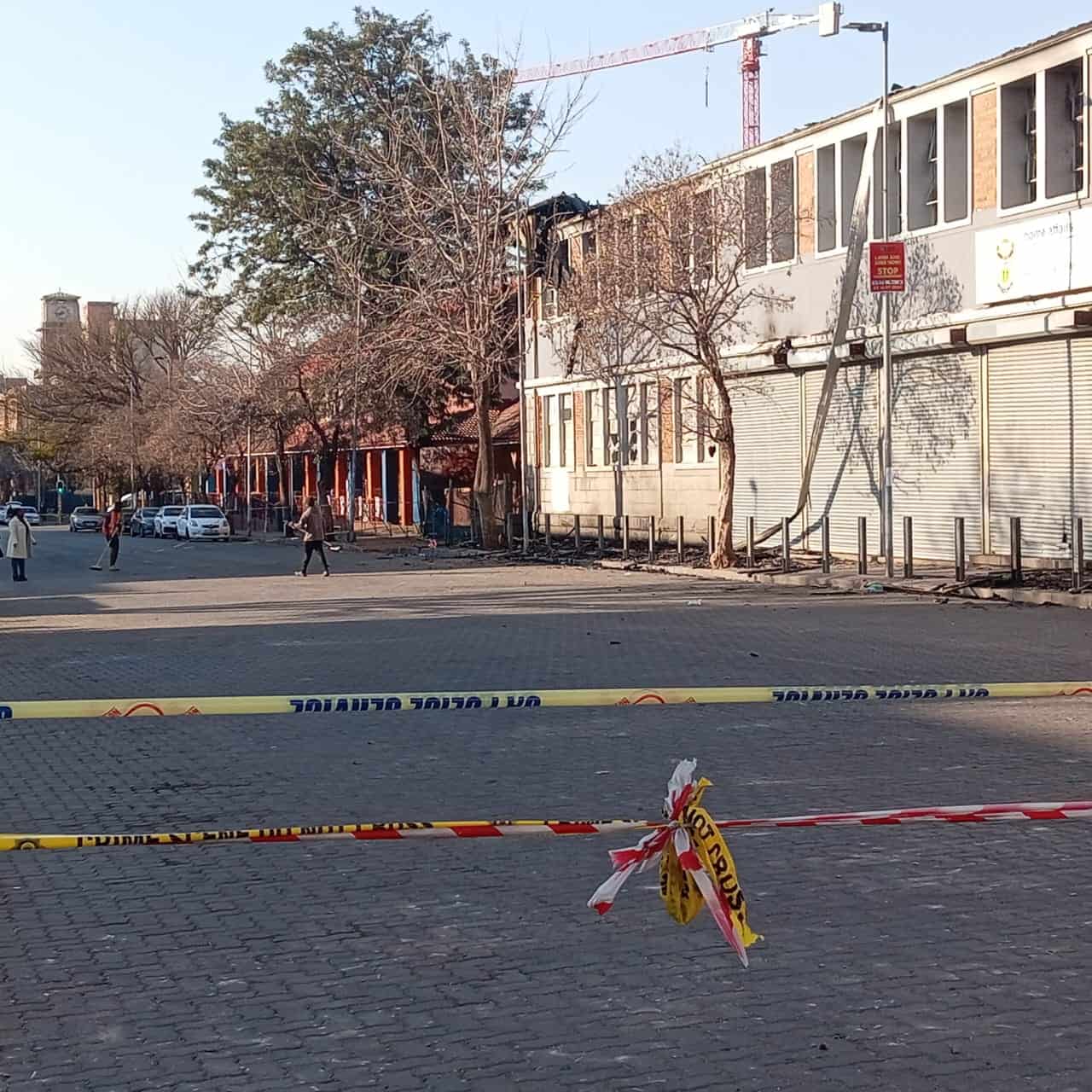Germiston Home Affairs clean-up under way as arson suspects appear in ...