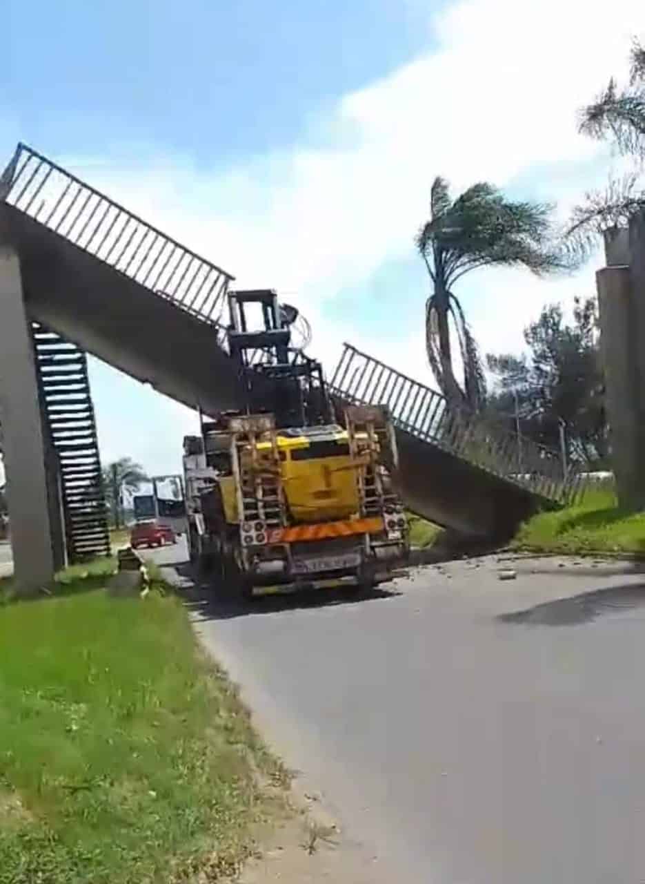 Truck crashes into pedestrian bridge, causing it to collapse ...