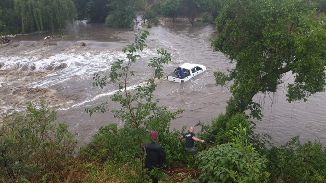 WATCH: Bakkie falls into river as Centurion bridge overflows | The Citizen